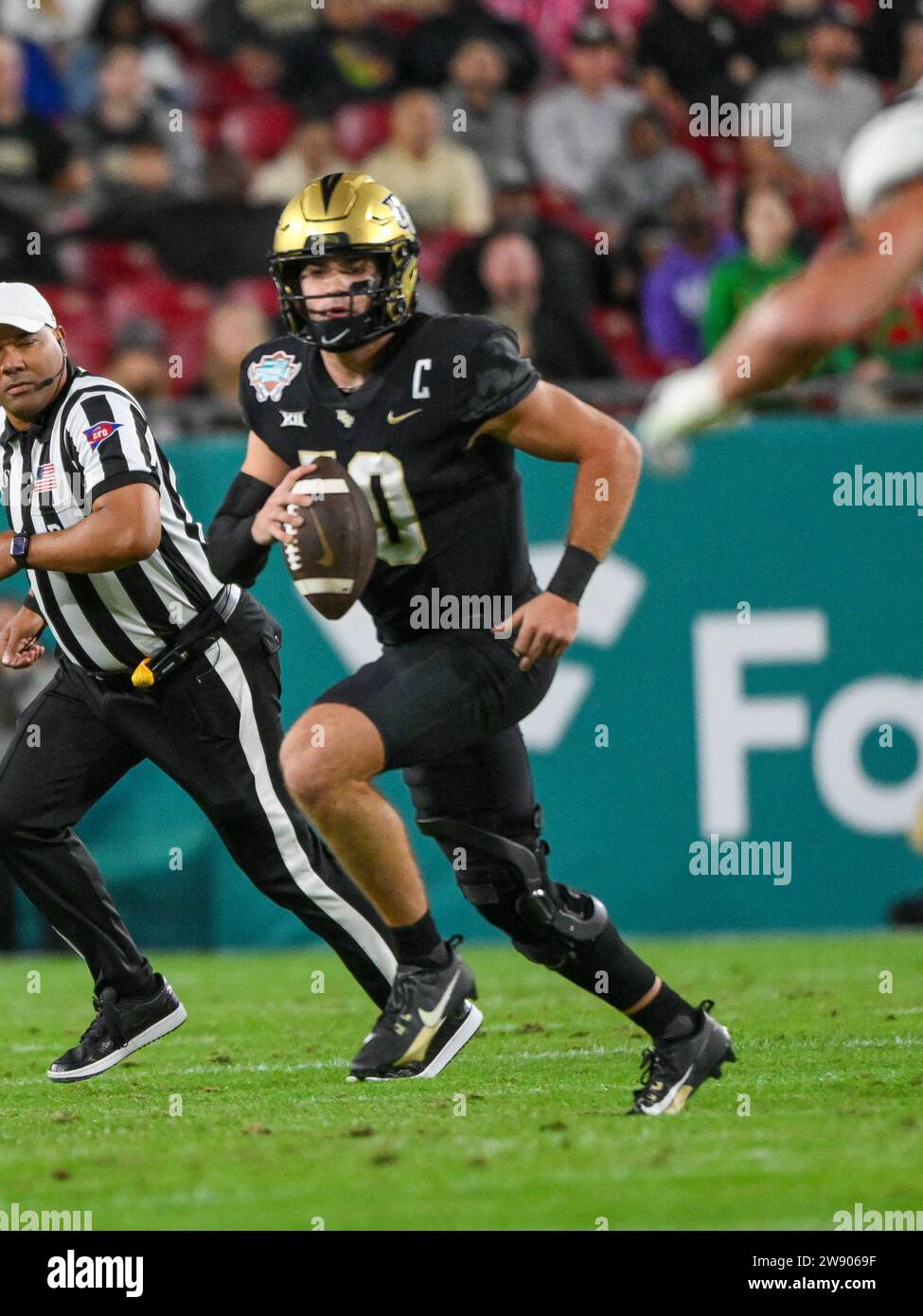 Tampa, FL, USA. 22nd Dec, 2023. UCF quarterback John Rhys Plumlee (10 ...