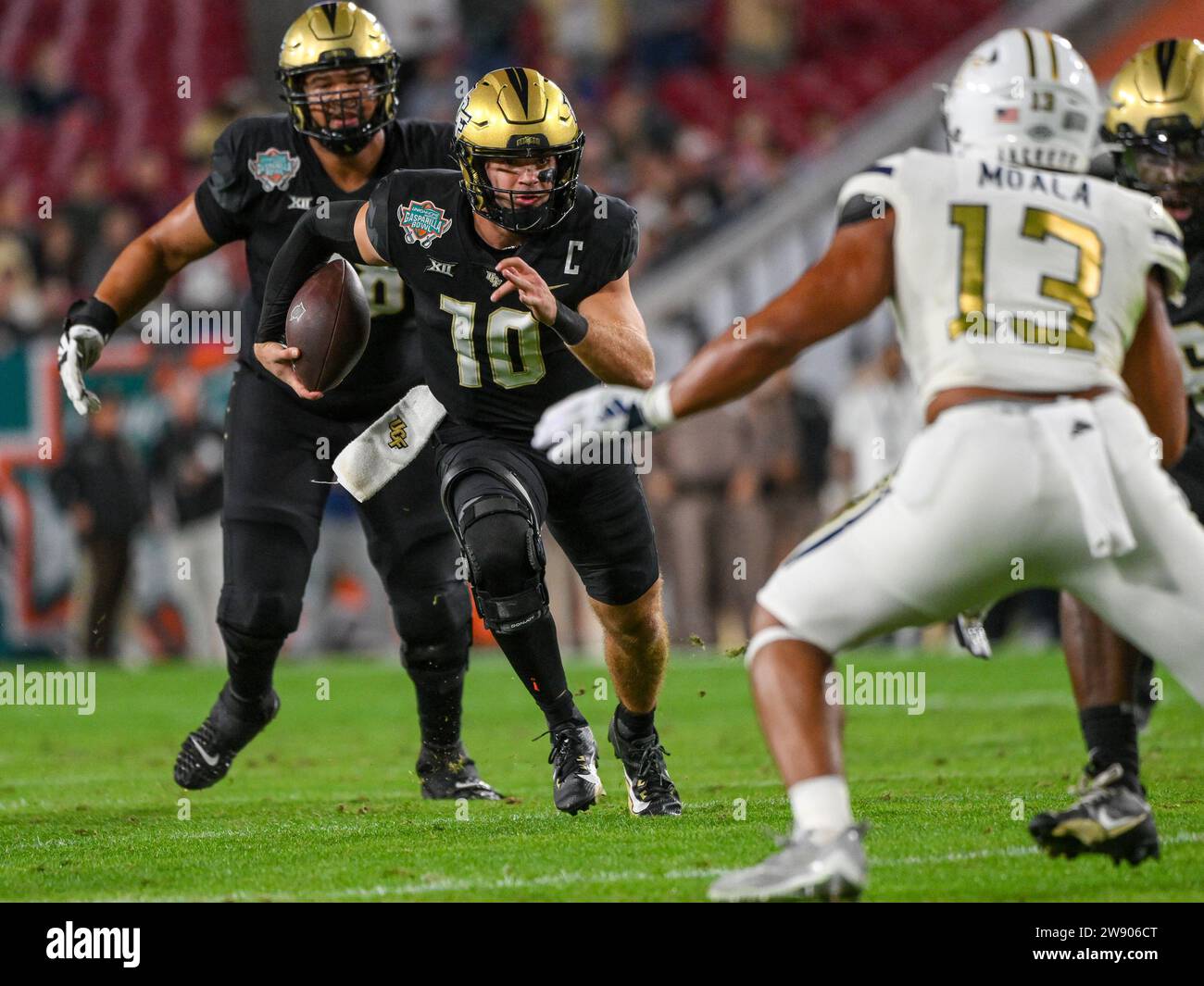 Tampa, FL, USA. 22nd Dec, 2023. UCF quarterback John Rhys Plumlee (10 ...