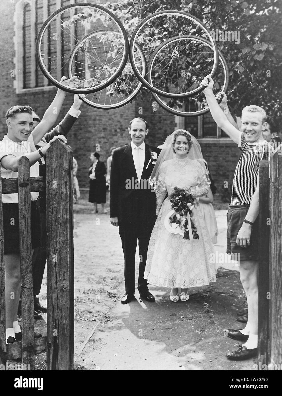 Wedding with a wheel arch in 1962 Stock Photo - Alamy