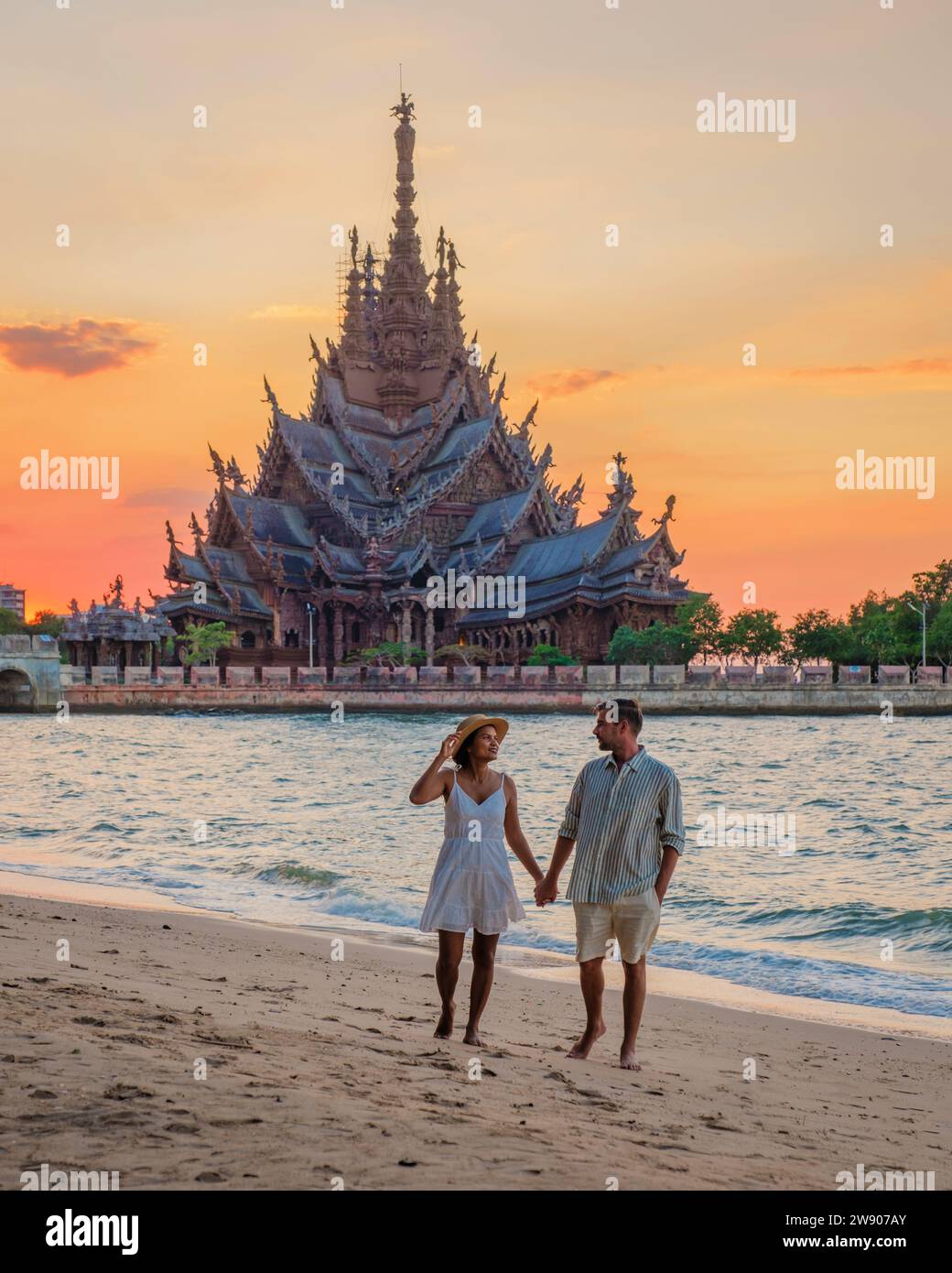 A diverse multiethnic couple of European men and Asian women visit The ...