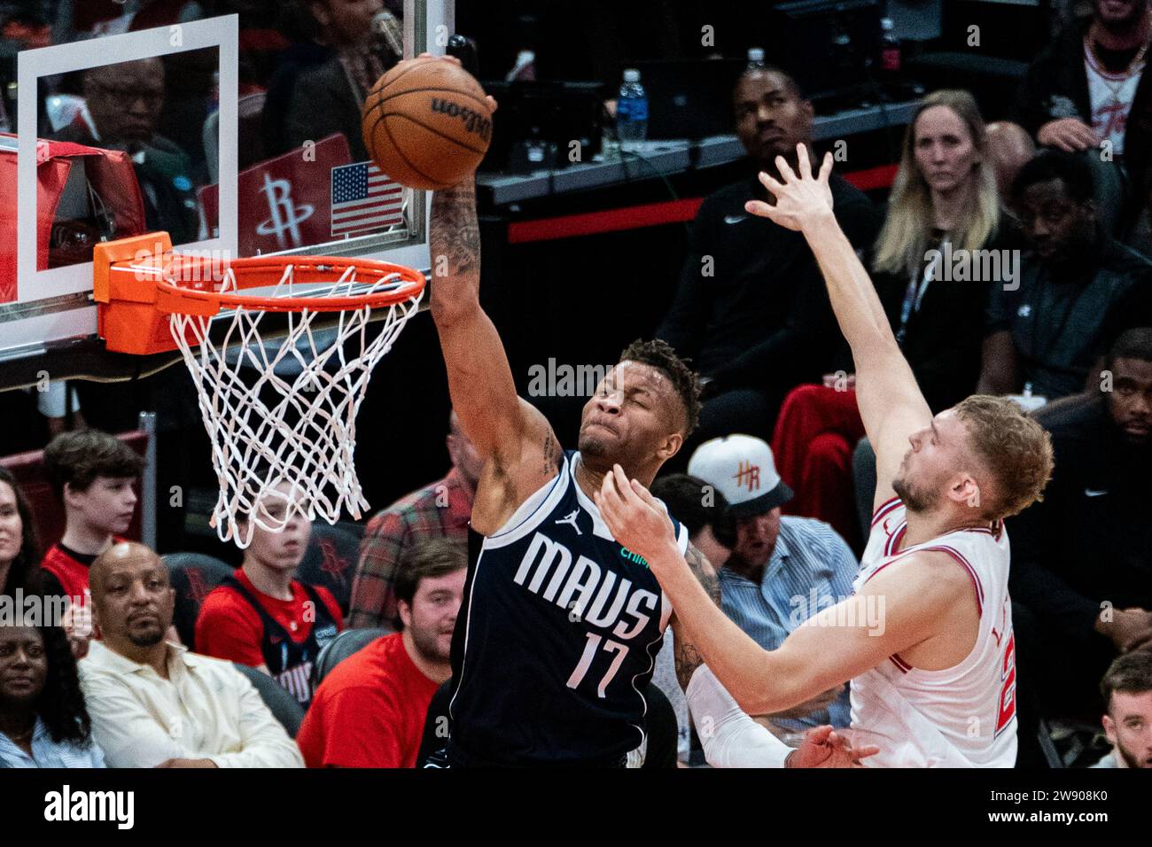 Houston, USA. 22nd Dec, 2023. Dexter Dennis (L) of Dallas Mavericks ...