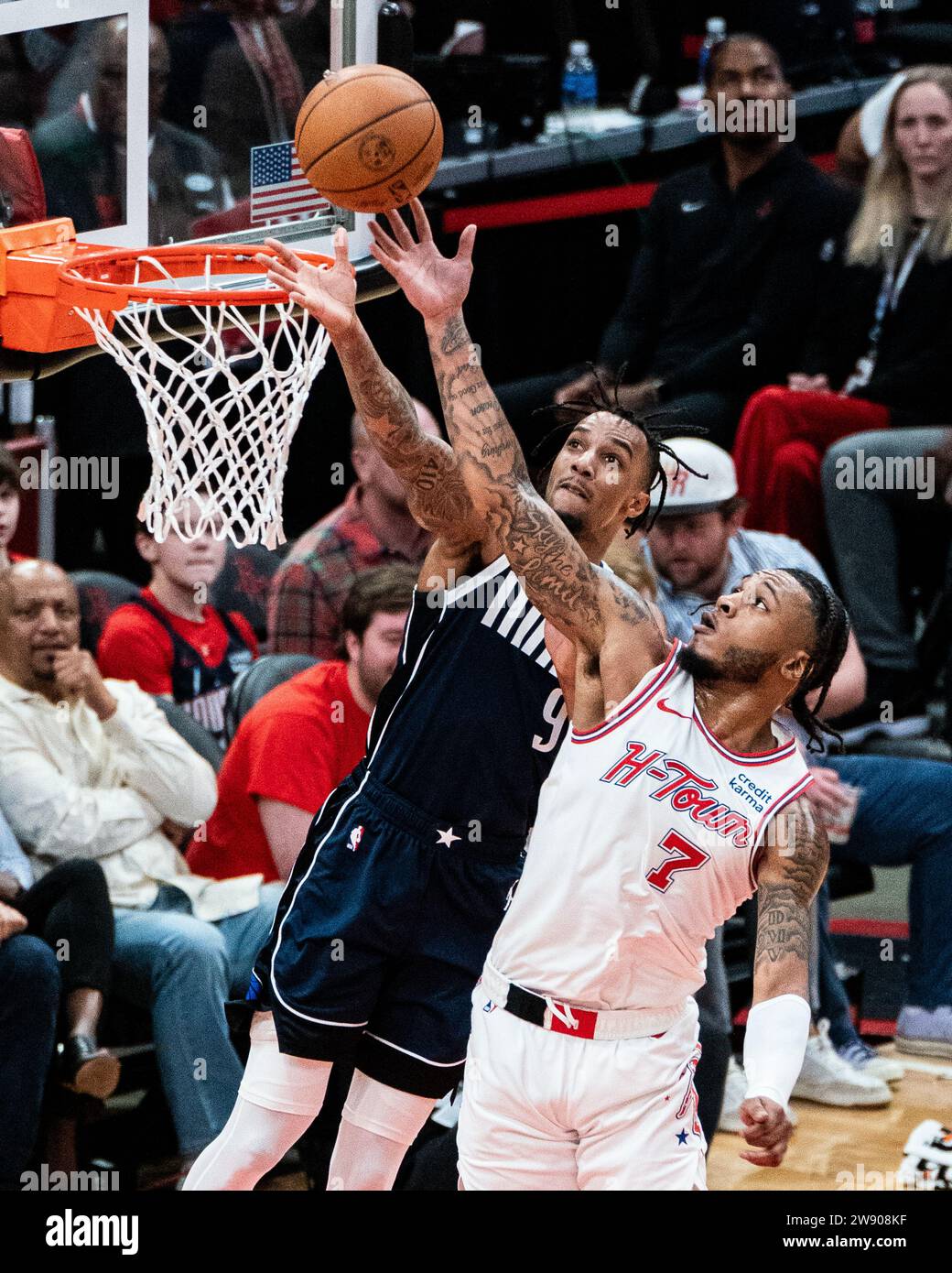 Houston, USA. 22nd Dec, 2023. Cam Whitmore (R) of Houston Rockets ...