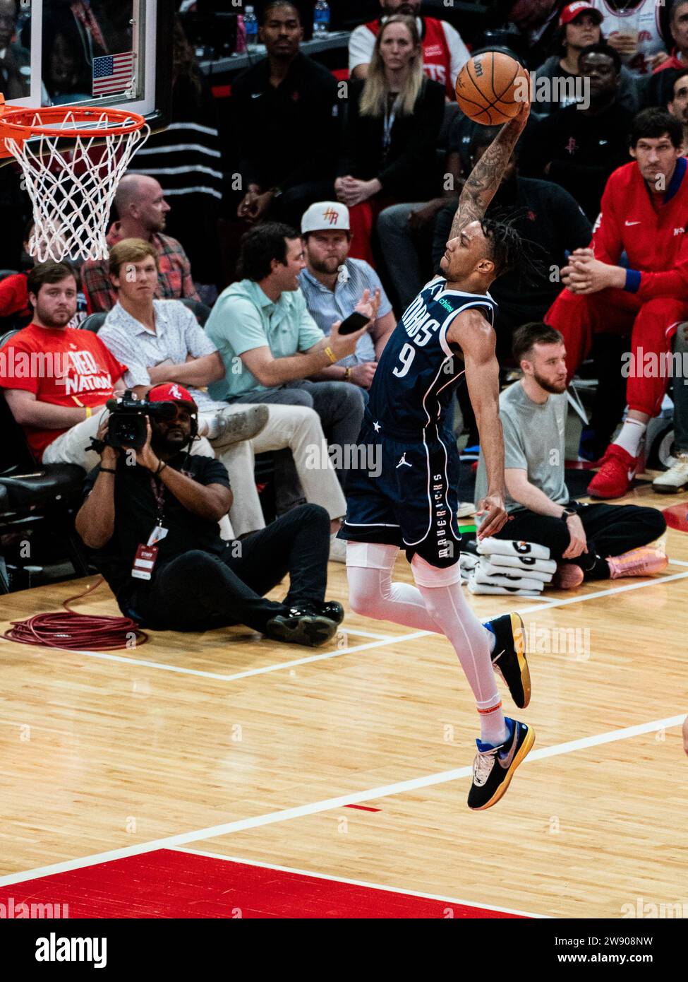 Houston, USA. 22nd Dec, 2023. A. J. Lawson of Dallas Mavericks dunks ...