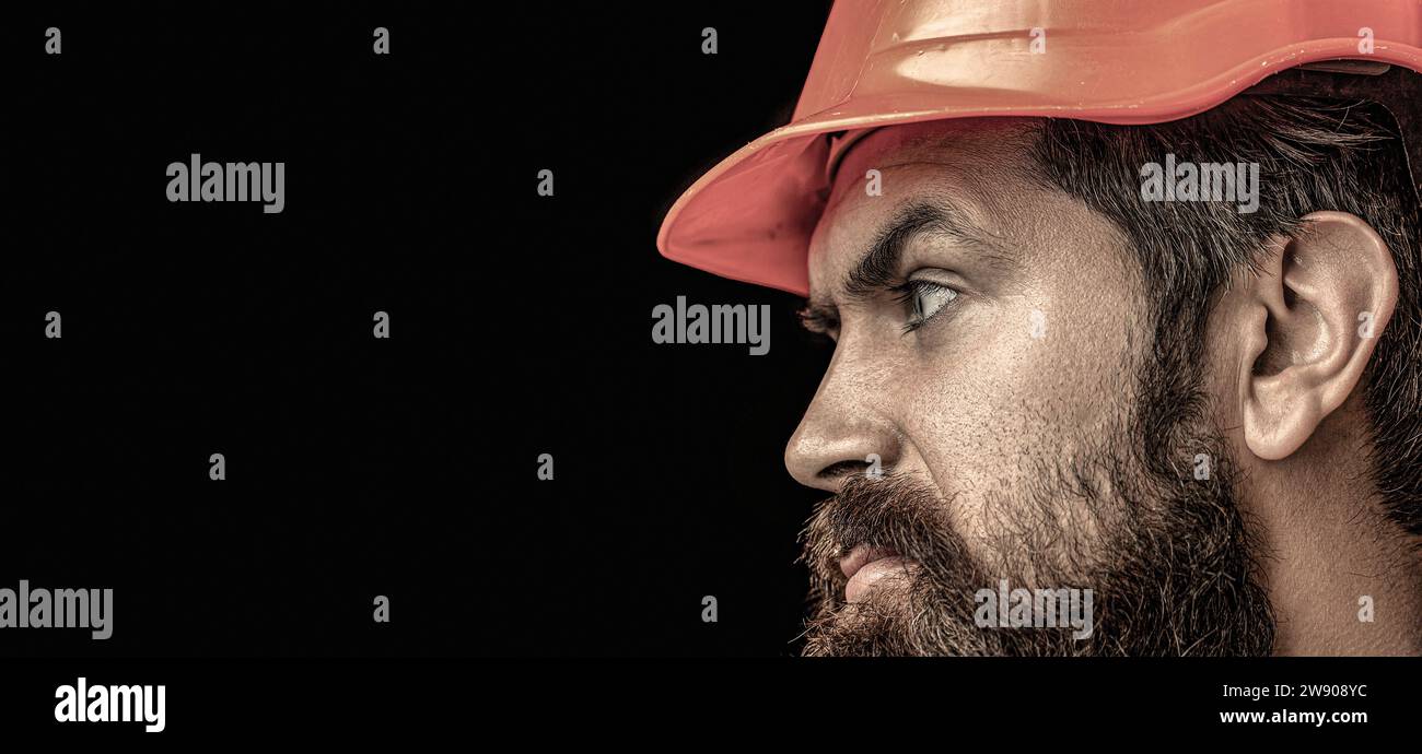 Bearded man worker with beard in building helmet or hard hat. Portrait ...