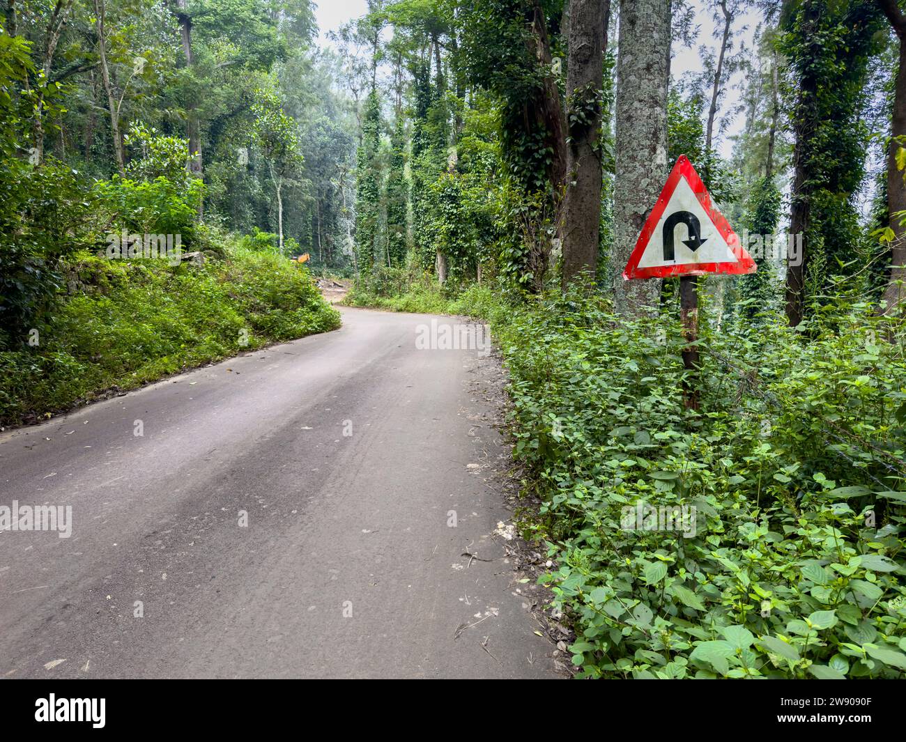 Road cautionary sign indicating right reverse bend ahead. Sign ...