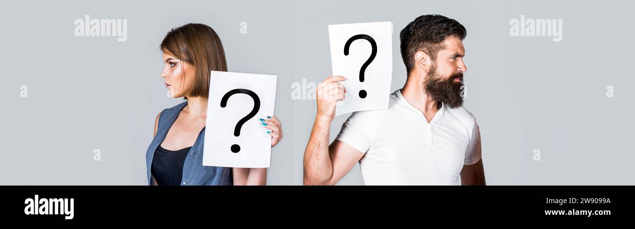 Portrait of couple holding paper question mark. Couple thinking about ...