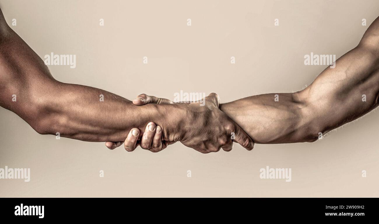 Rescue, helping gesture or hands. Strong hold. Two hands, helping hand of a friend. Handshake ...