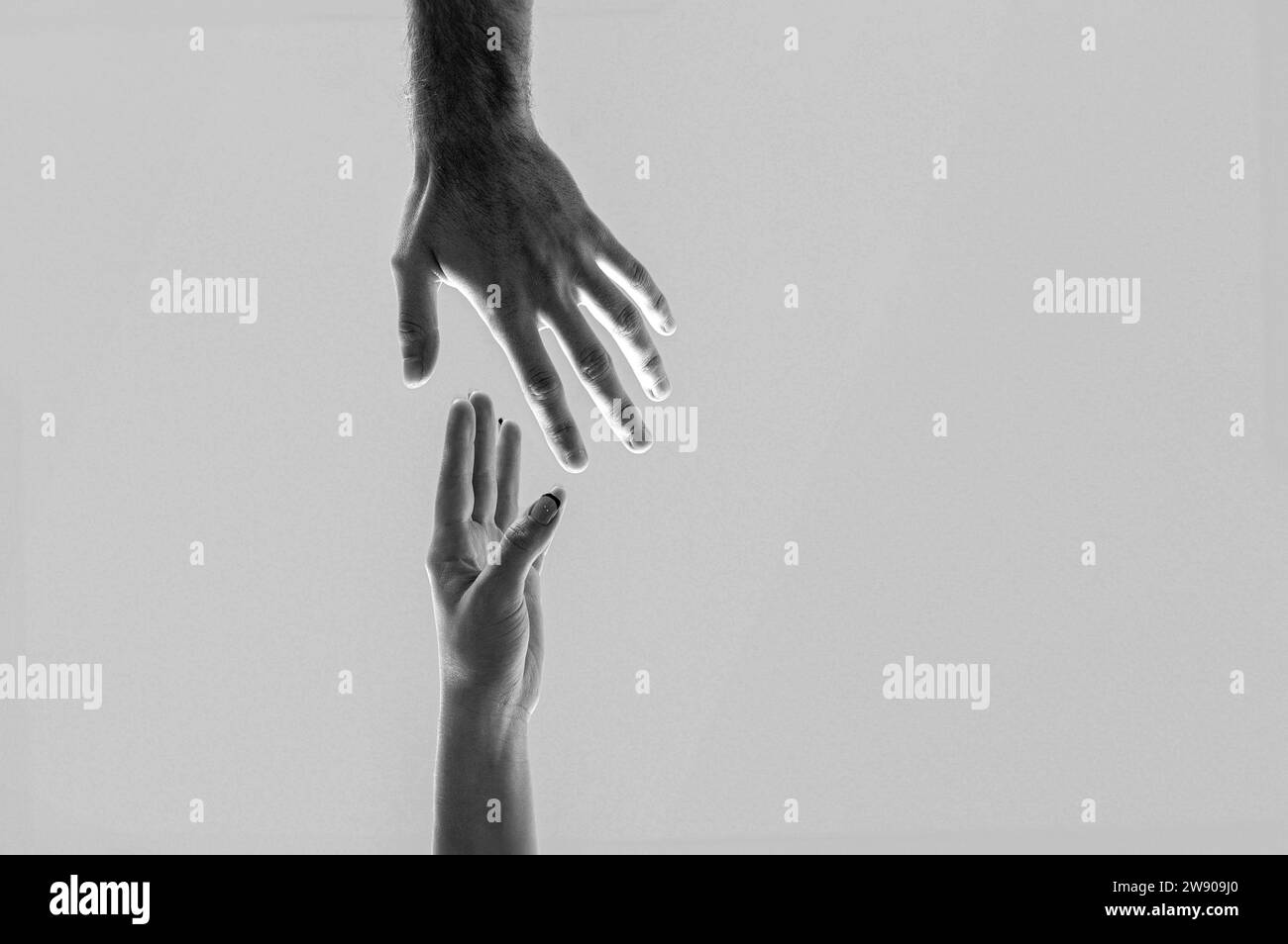 Helping hand concept and international day of peace, support. Two hands ...