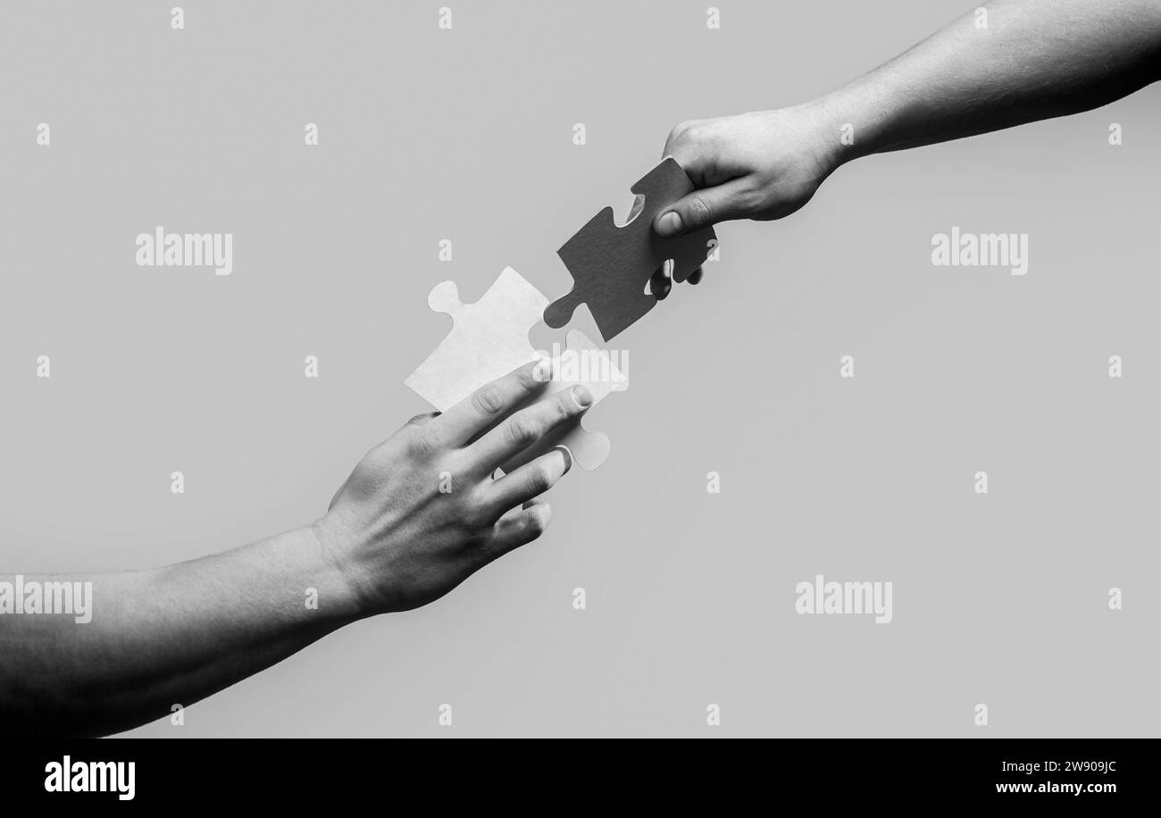 Two man build puzzle on hi-res stock photography and images - Alamy