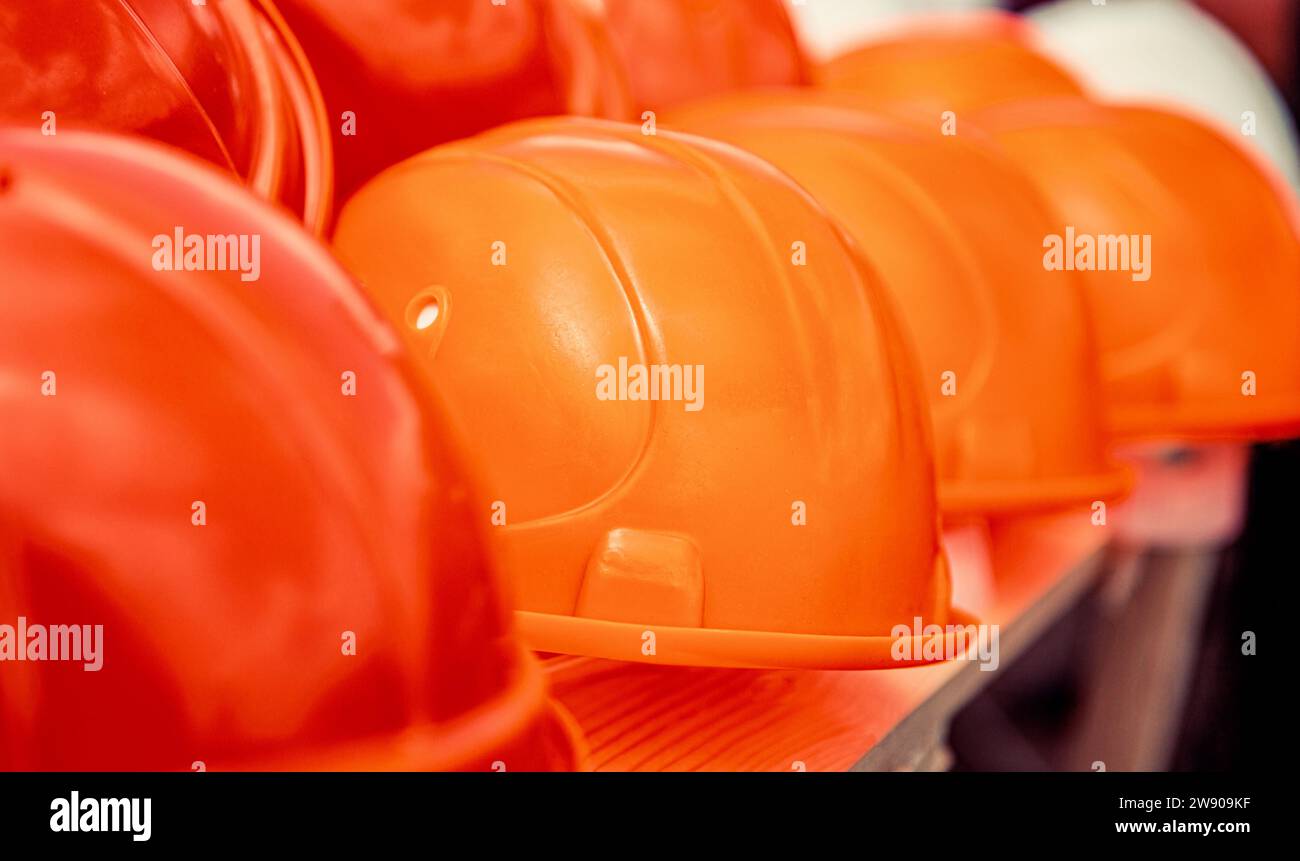 Yellow safety helmets. Orange safety helmets construction. Set orange ...