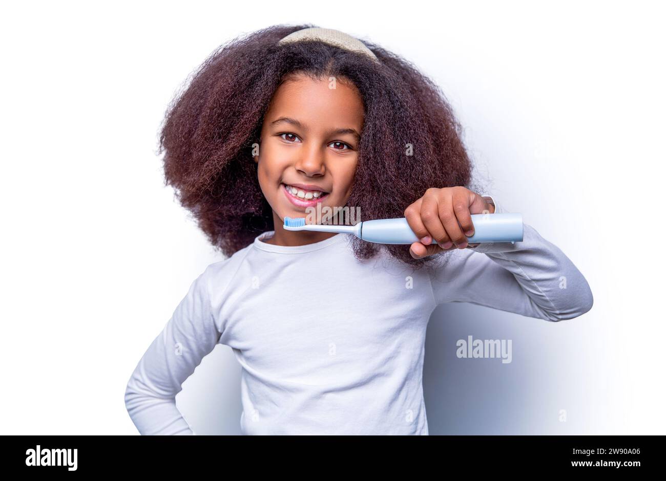 Little girl toothbrush closeup. Little cute african american girl ...