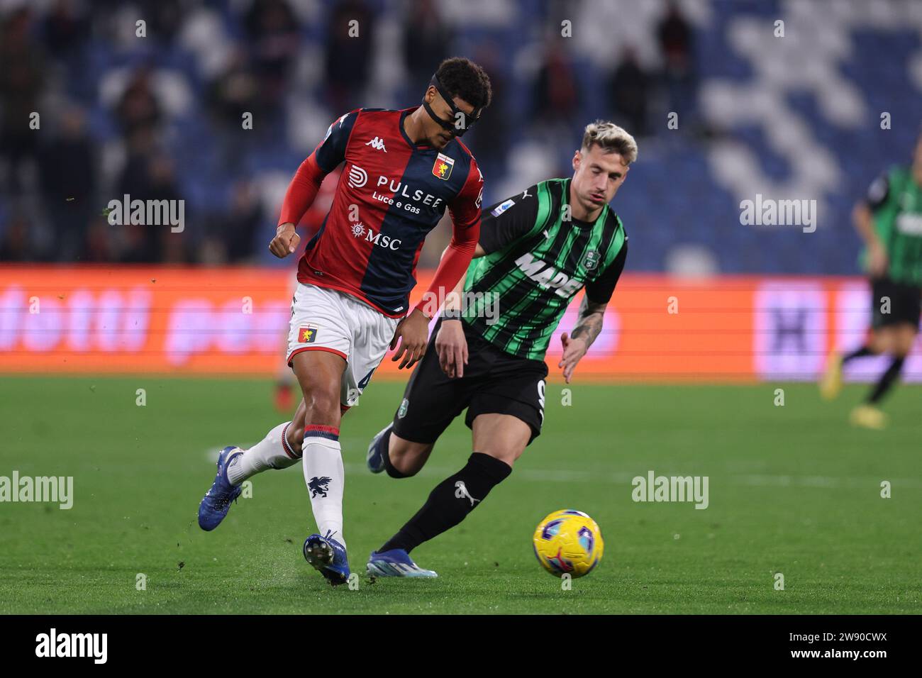 Koni De Winter (Genoa)Andrea Pinamonti (Sassuolo) during the Italian ...
