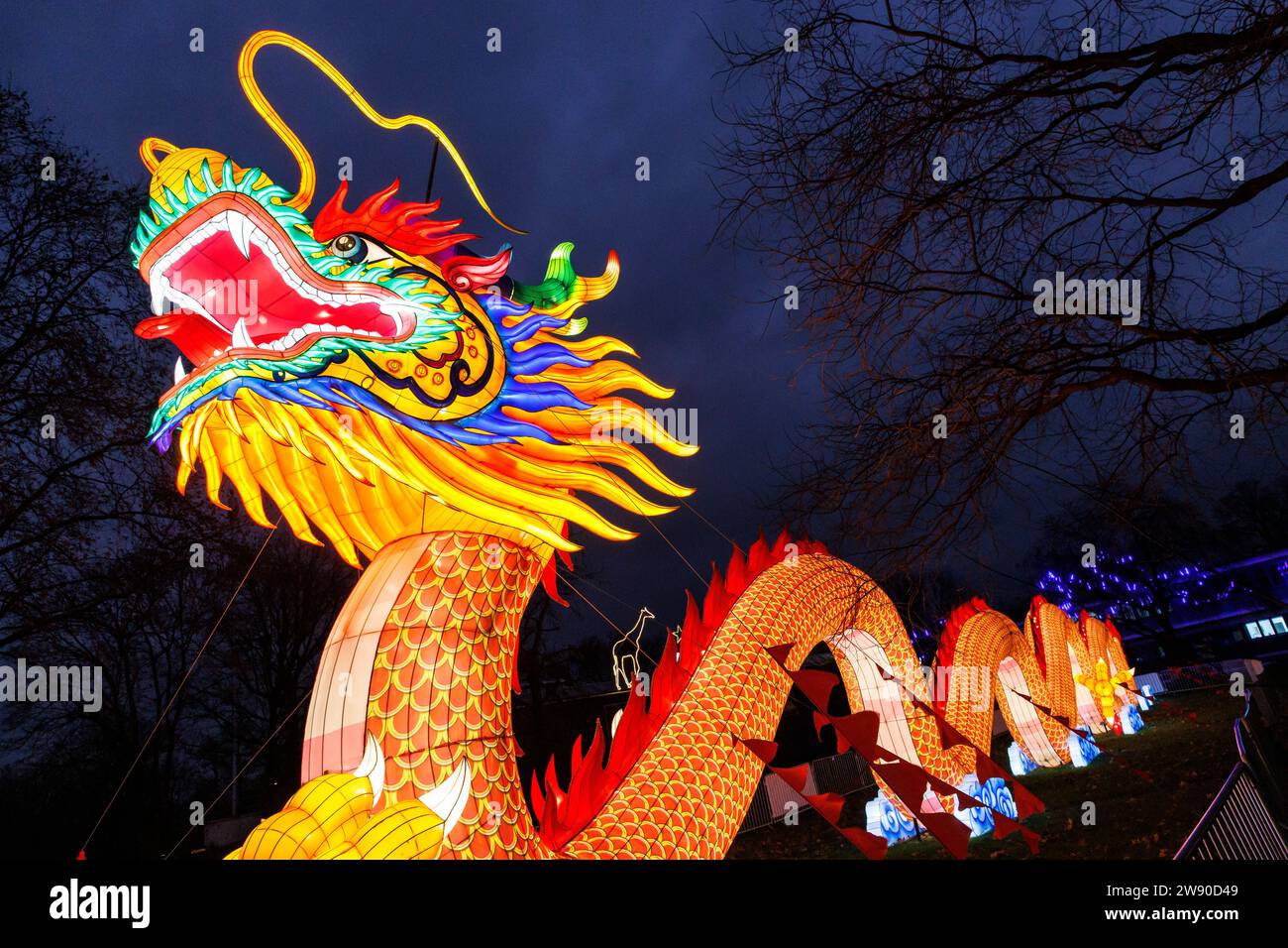 a large illuminated dragon advertises the China Lights Festival at ...