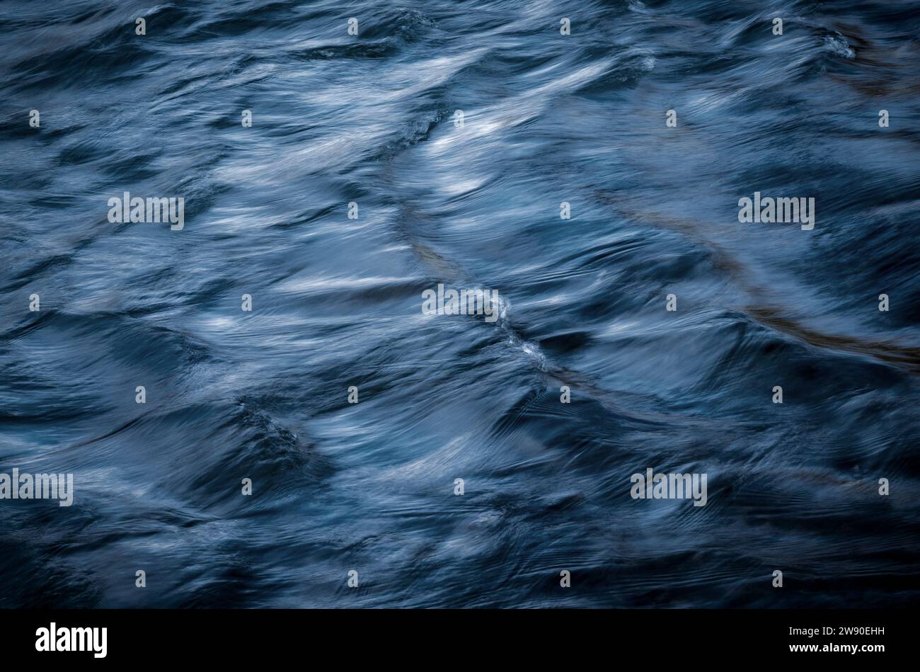 abstract nature background dark abstract background of river surface ...
