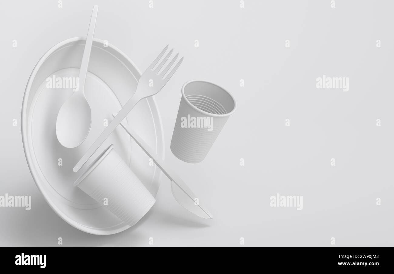 Set of disposable utensils like plate, folk, spoon,knife and cup on ...