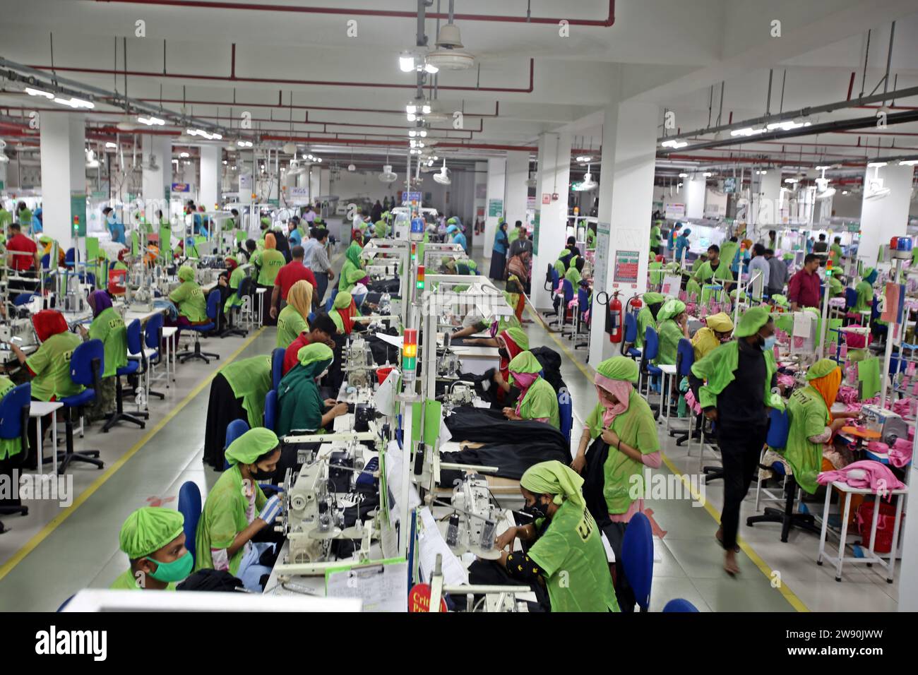 Ready-made garments worker works in a garments factory in Dhaka ...