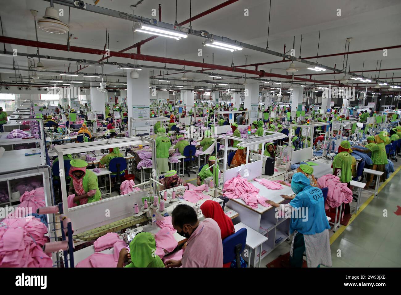 Ready-made garments worker works in a garments factory in Dhaka ...