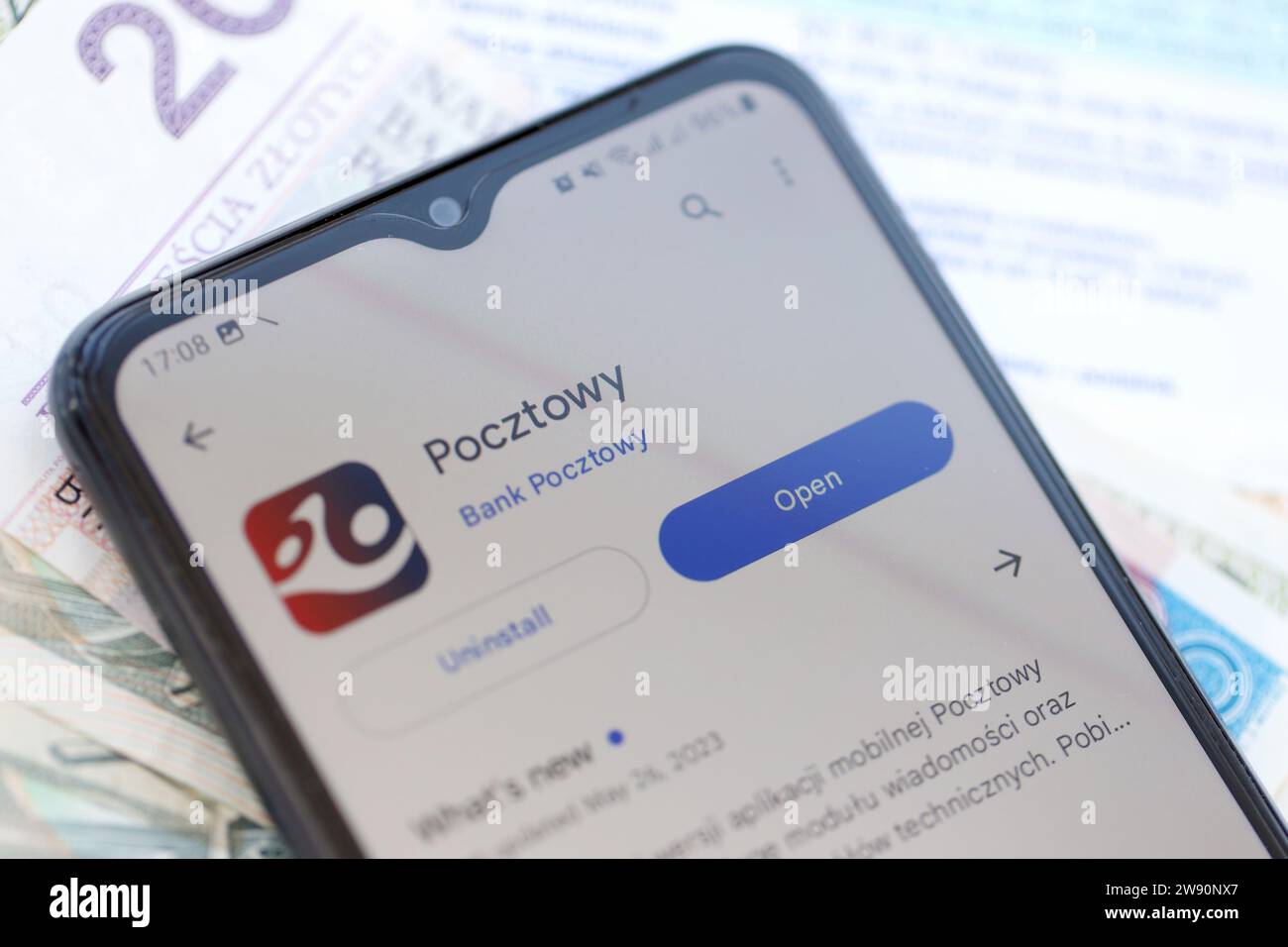 TERNOPIL, UKRAINE - AUGUST 3, 2023 Pocztowy bank application on screen ...