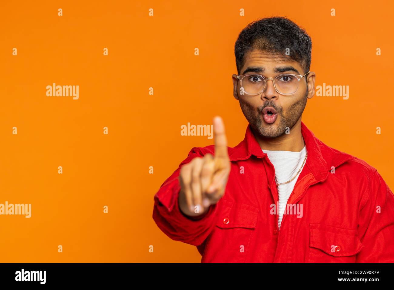 Indian young man shakes finger and saying no, be careful, scolding and ...
