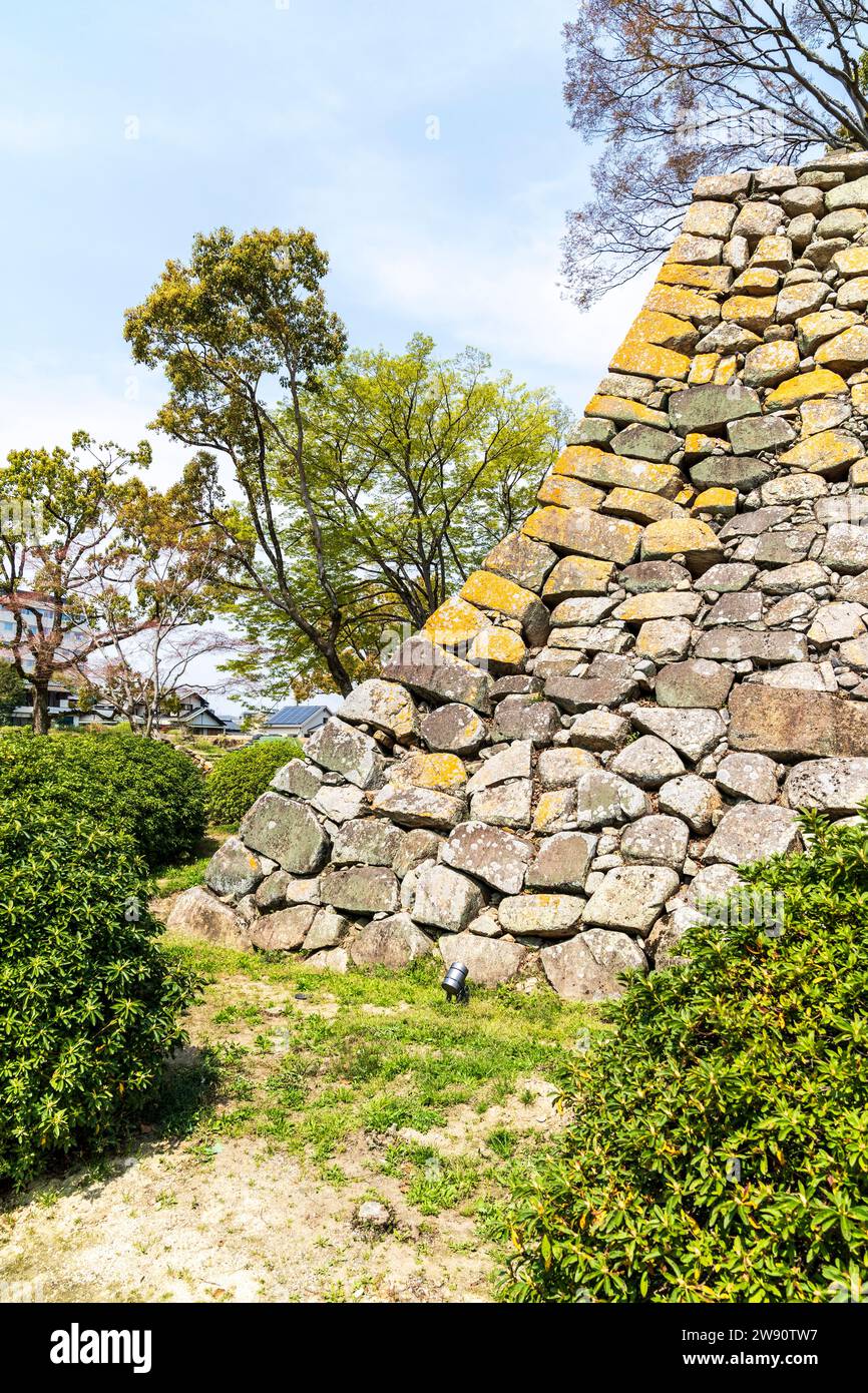 Detail, corner stones and sloped face of an Ishigaki stone wall ...