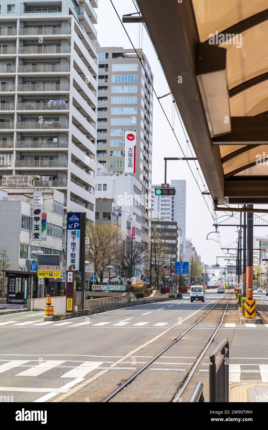 View from the yanagawa tram stop on the Momotaro-odori, a four laned ...