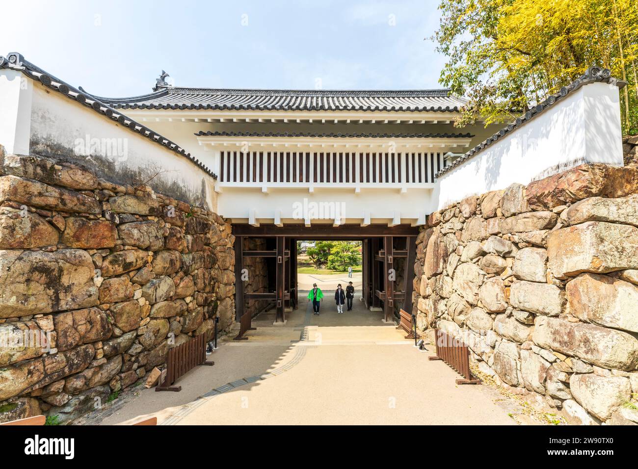 Ishigaki stone walls topped with white dobei plaster walls. and the ...