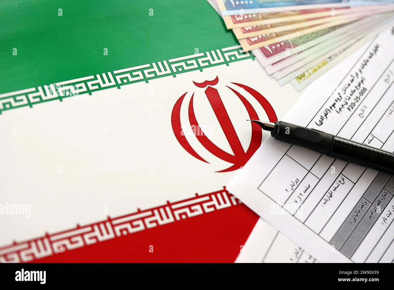 Iranian annual income tax return form F20-25-006 ready to fill on table ...