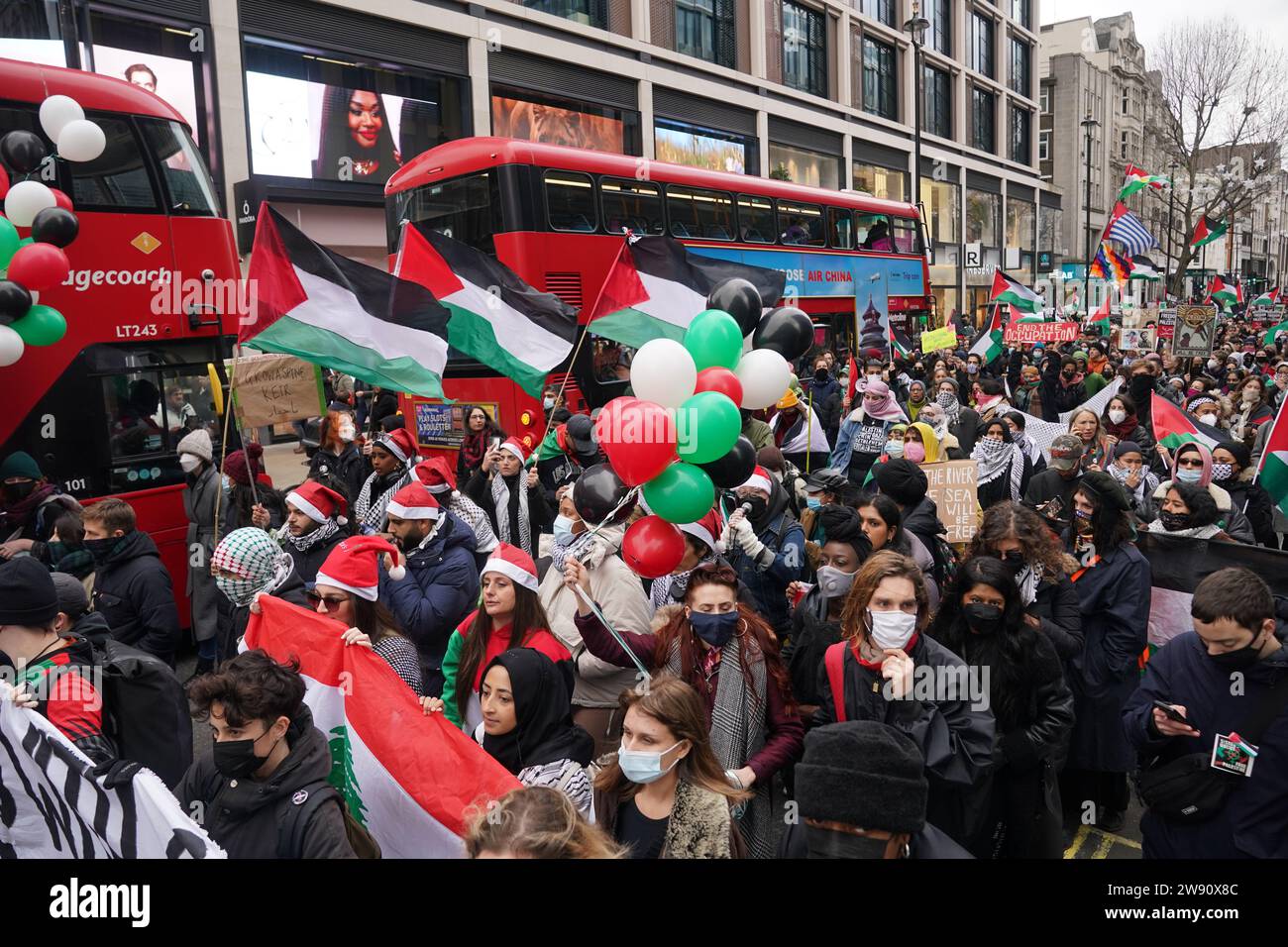 Protesters during a pro-Palestine demonstration, organised by direct ...