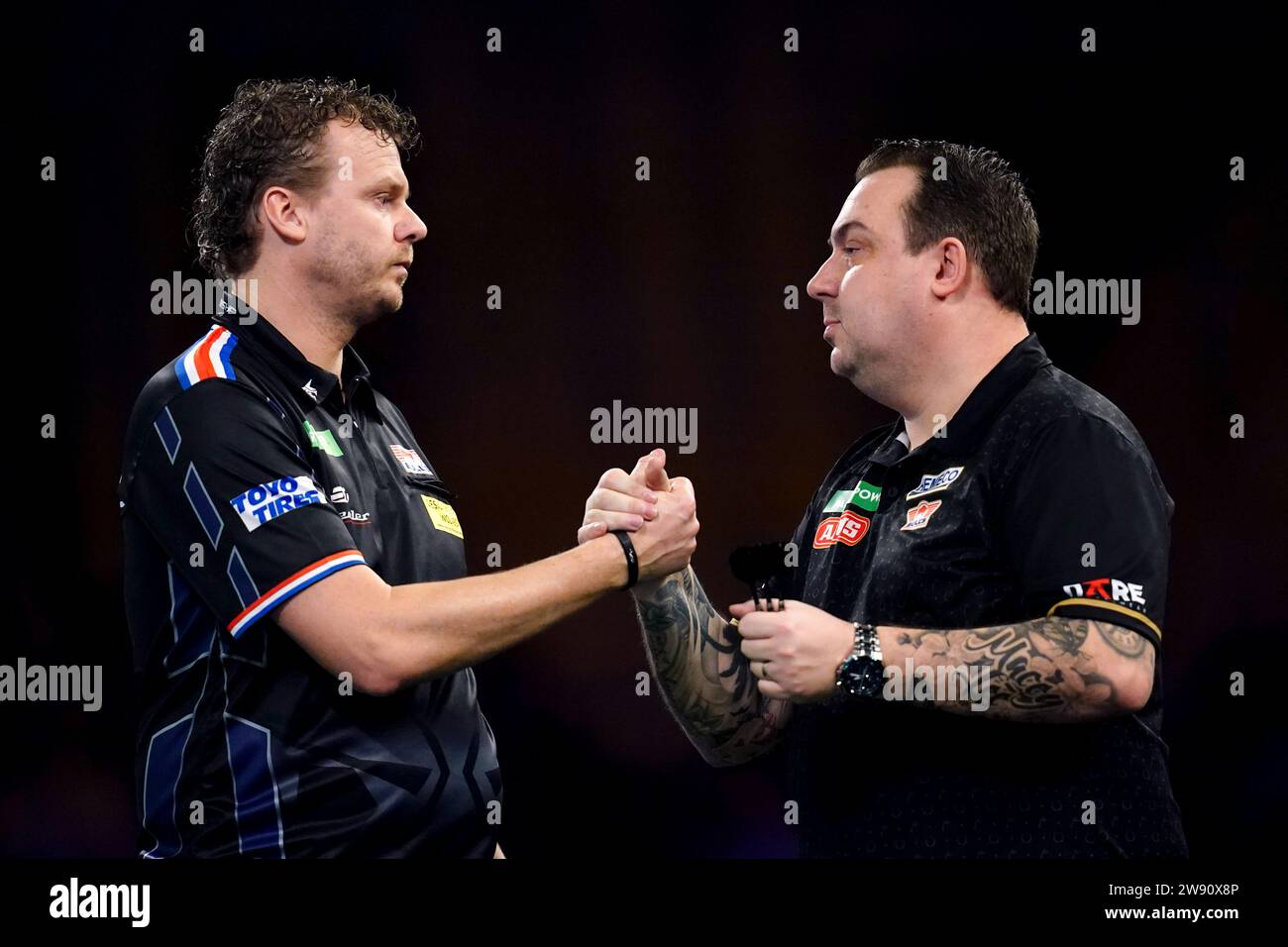 Richard Veenstra (left) is congratulated on his victory by Kim ...