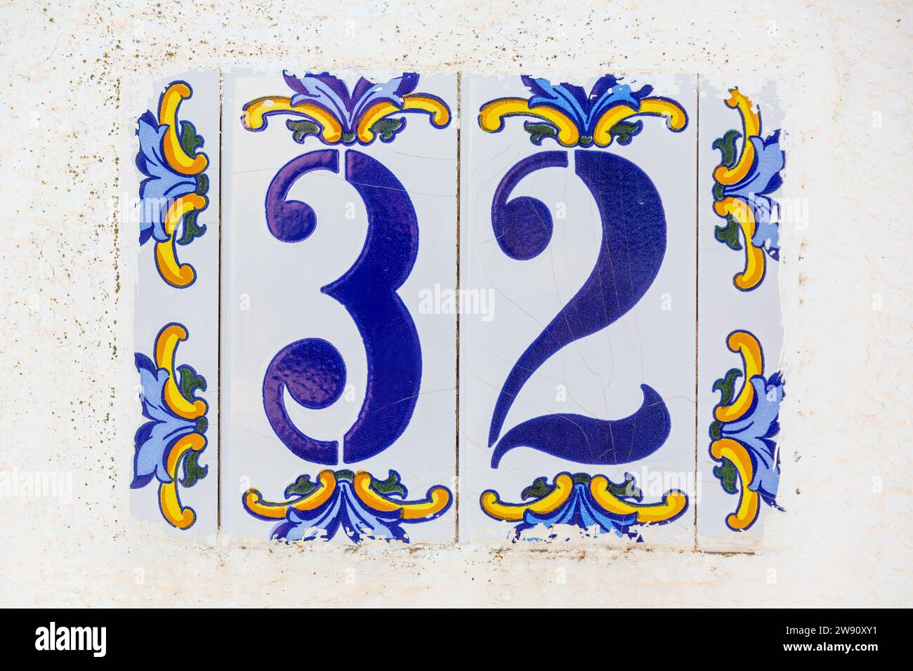 Old Weathered House Number 32, Tile on Wall Stock Photo - Alamy
