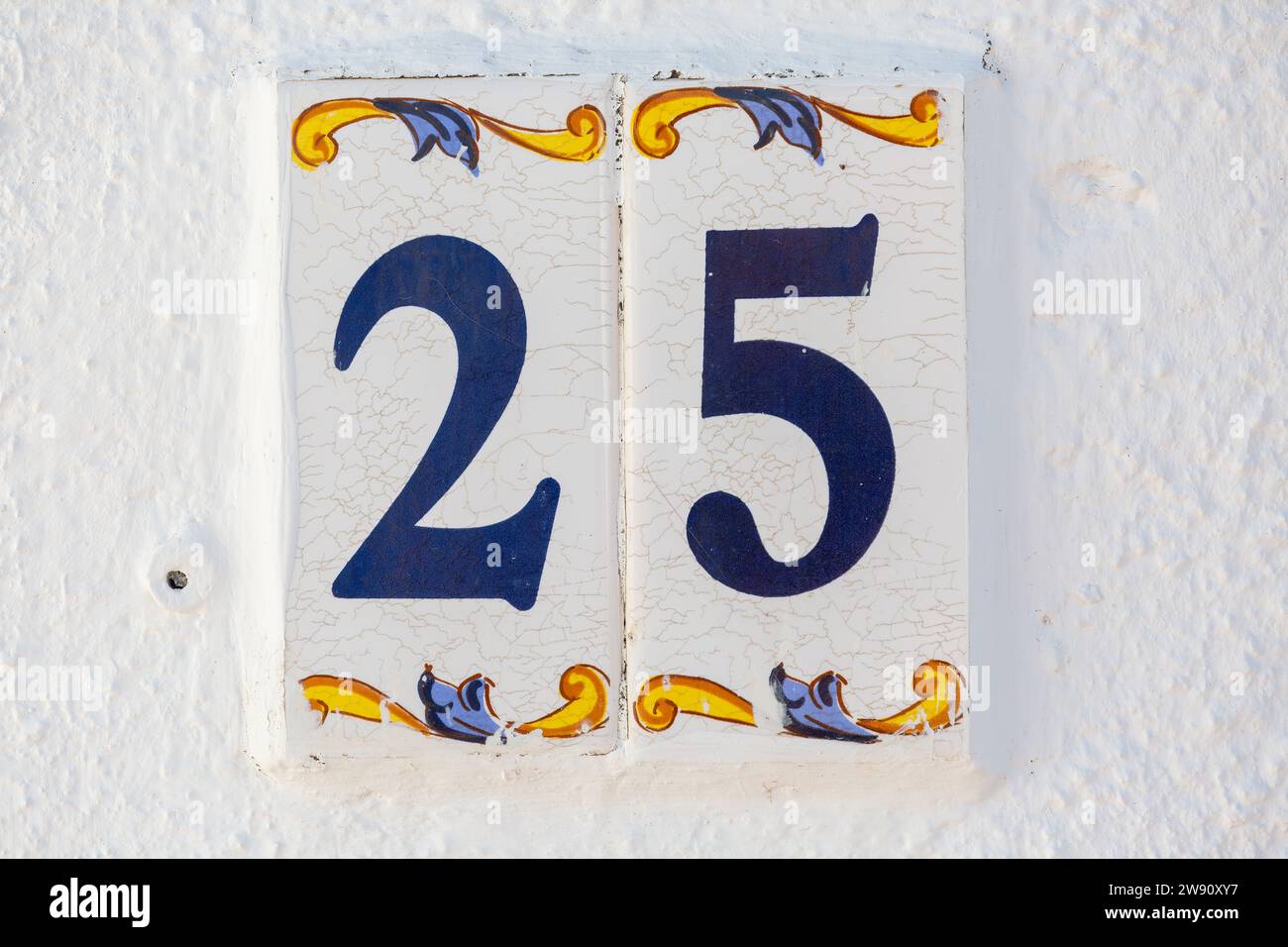 Old Weathered House Number 25, Tile on Wall Stock Photo - Alamy