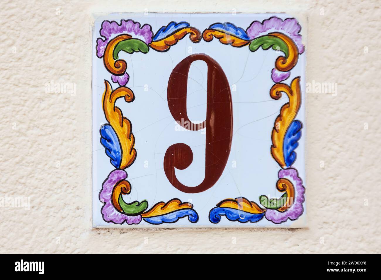 Old Weathered House Number 9, Tile on Wall Stock Photo - Alamy