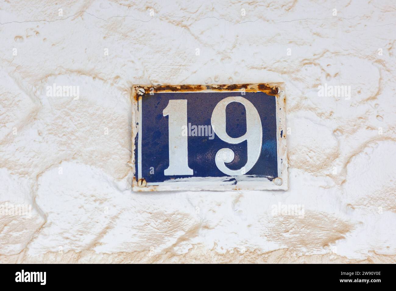 Old Weathered House Number 19, Tile on Wall Stock Photo - Alamy