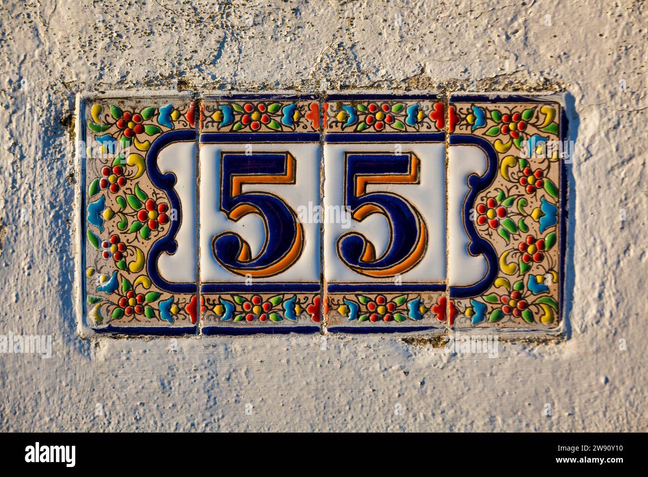Old Weathered House Number 55, Tile on Wall Stock Photo - Alamy
