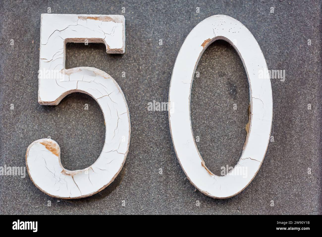 Old Weathered House Number 50, Tile on Wall Stock Photo - Alamy