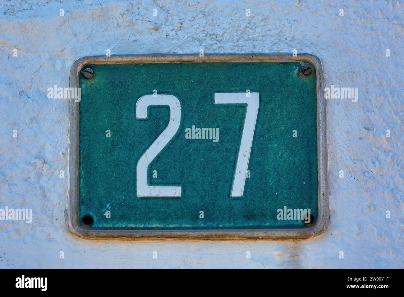 Old Weathered House Number 27, Tile on Wall Stock Photo - Alamy