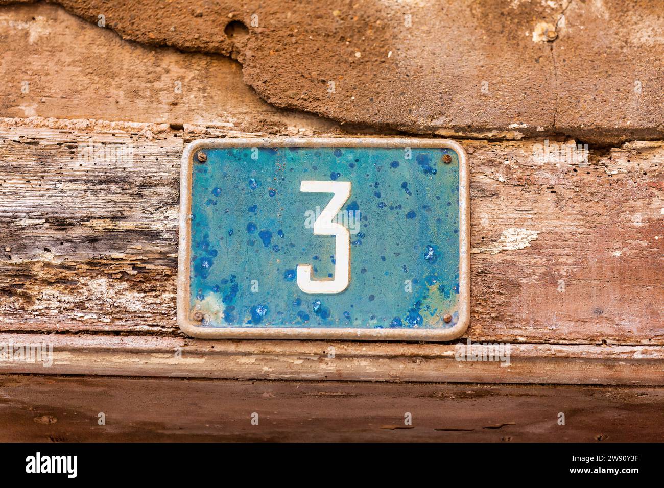 Old Weathered House Number 3, Tile on Wall Stock Photo - Alamy