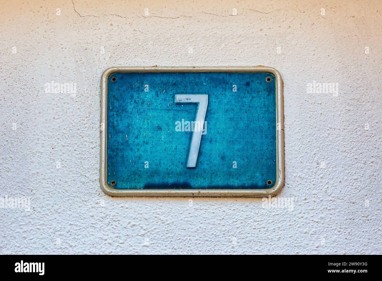 Old Weathered House Number 7, Tile on Wall Stock Photo - Alamy