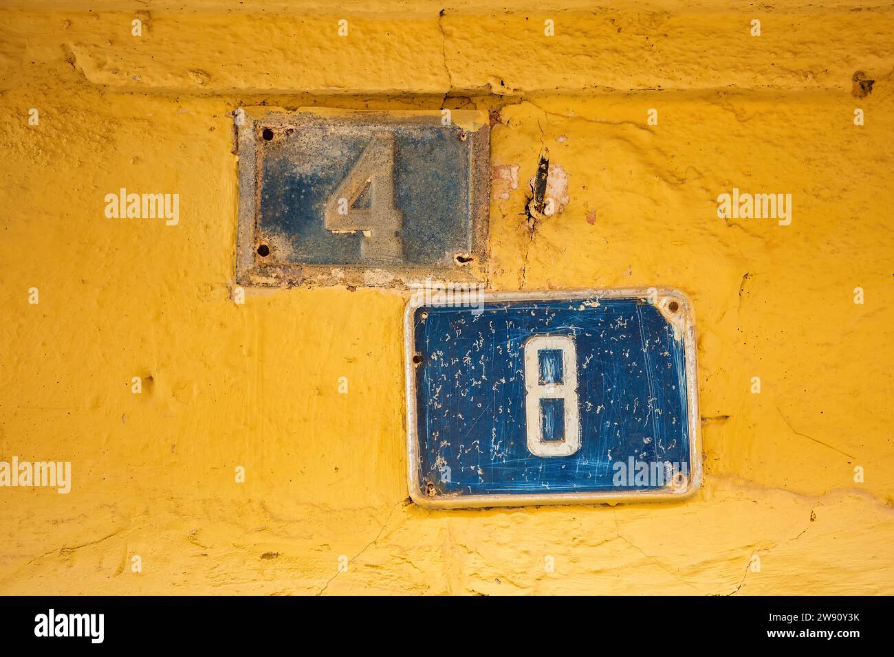 Two old Weathered House Numbers on the same entrance, 4 and 8, Tile on ...
