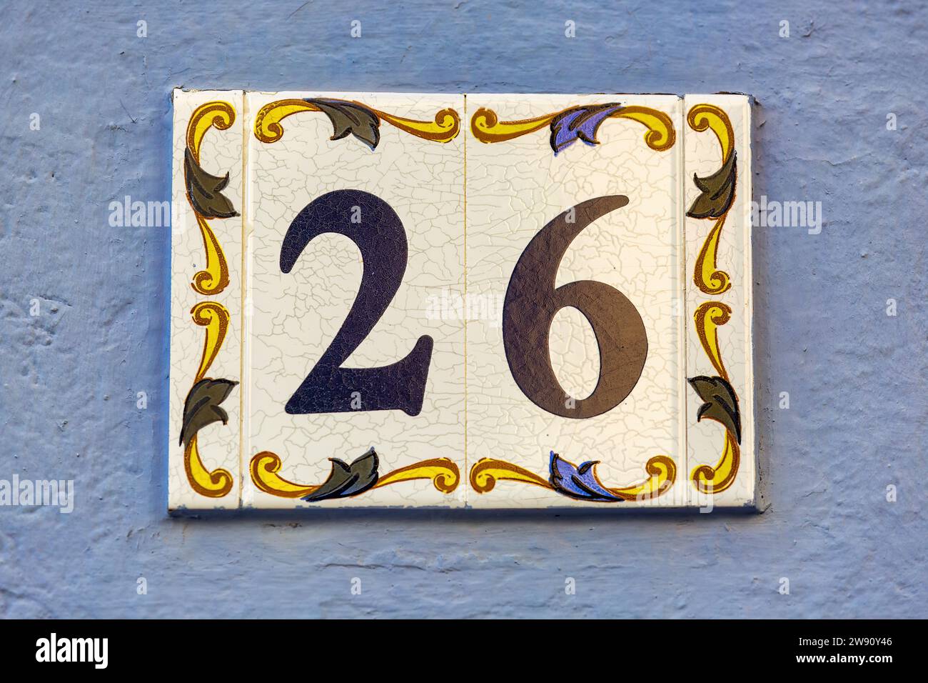 Old Weathered House Number 26, Tile on Wall Stock Photo - Alamy