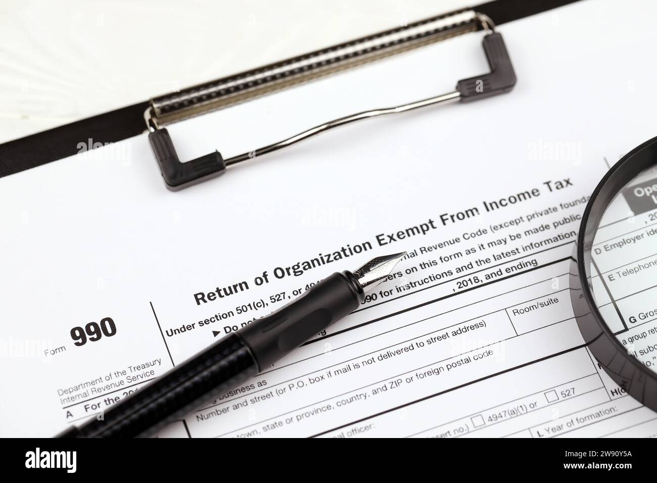 Form 990 Return of organization exempt from income tax on A4 tablet ...