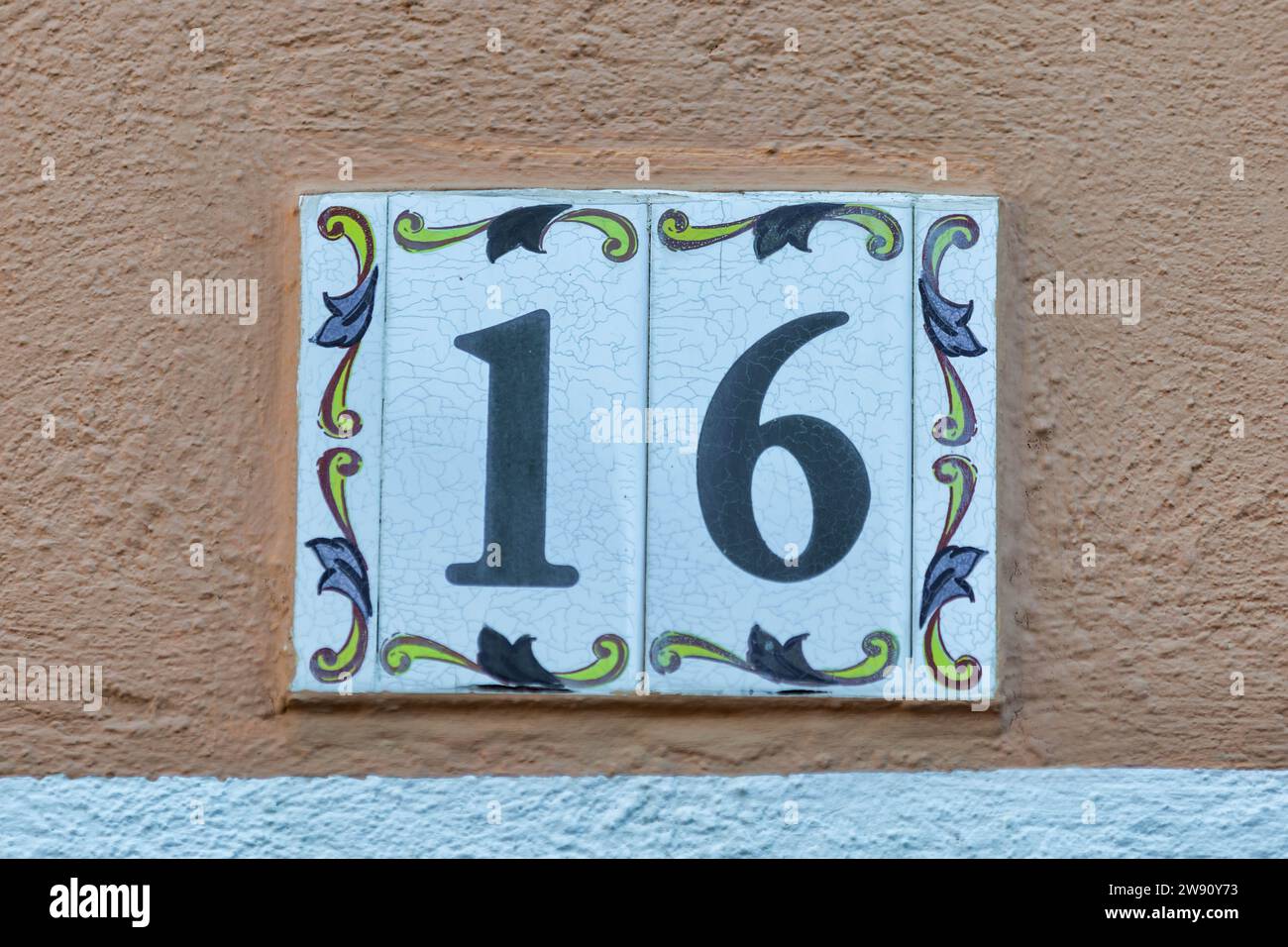 Old Weathered House Number 16, Tile on Wall Stock Photo - Alamy