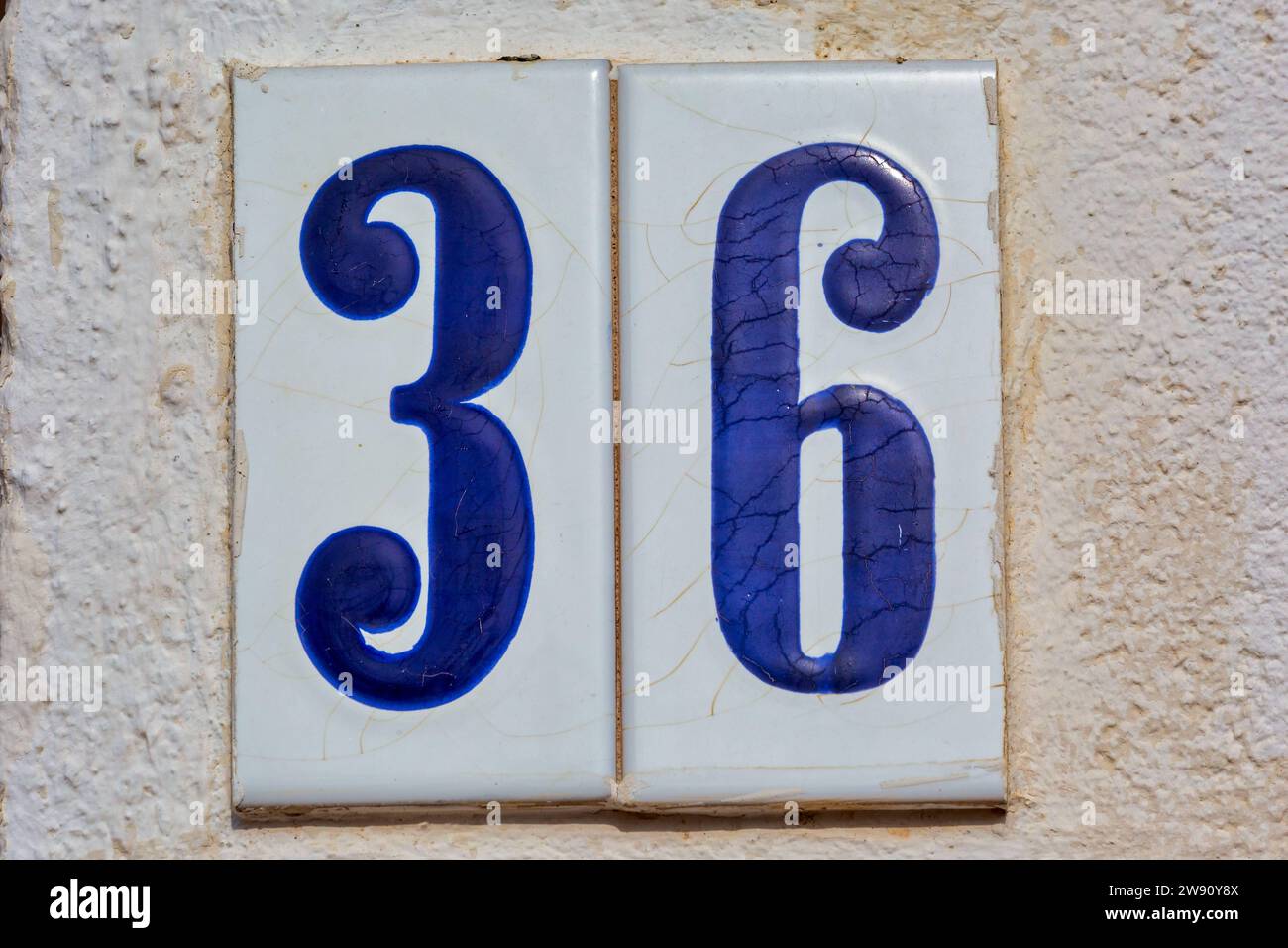 Old Weathered House Number 36, Tile on Wall Stock Photo - Alamy
