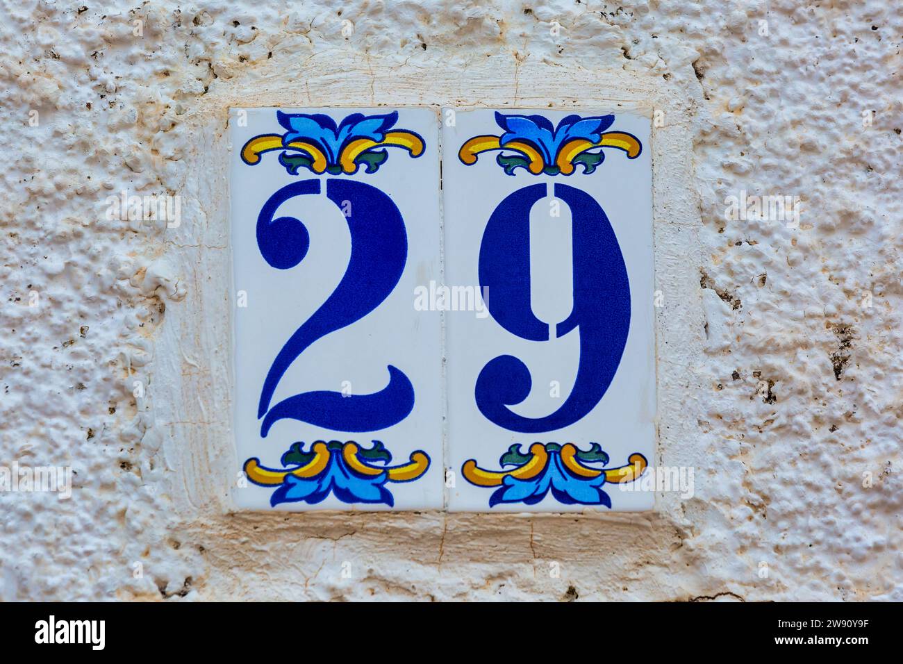 Old Weathered House Number 29, Tile on Wall Stock Photo - Alamy