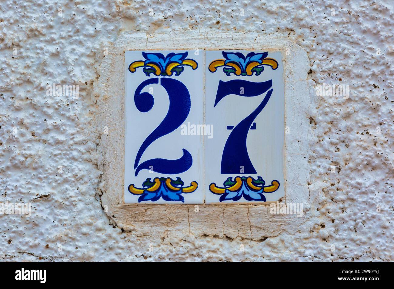 Old Weathered House Number 27, Tile on Wall Stock Photo - Alamy