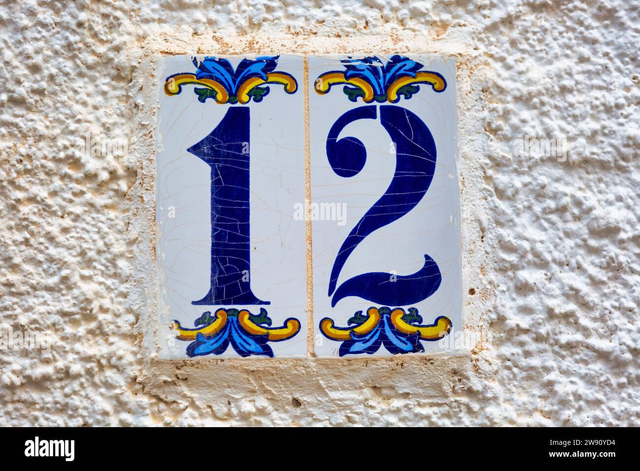 Old Weathered House Number 12, Tile on Wall Stock Photo - Alamy