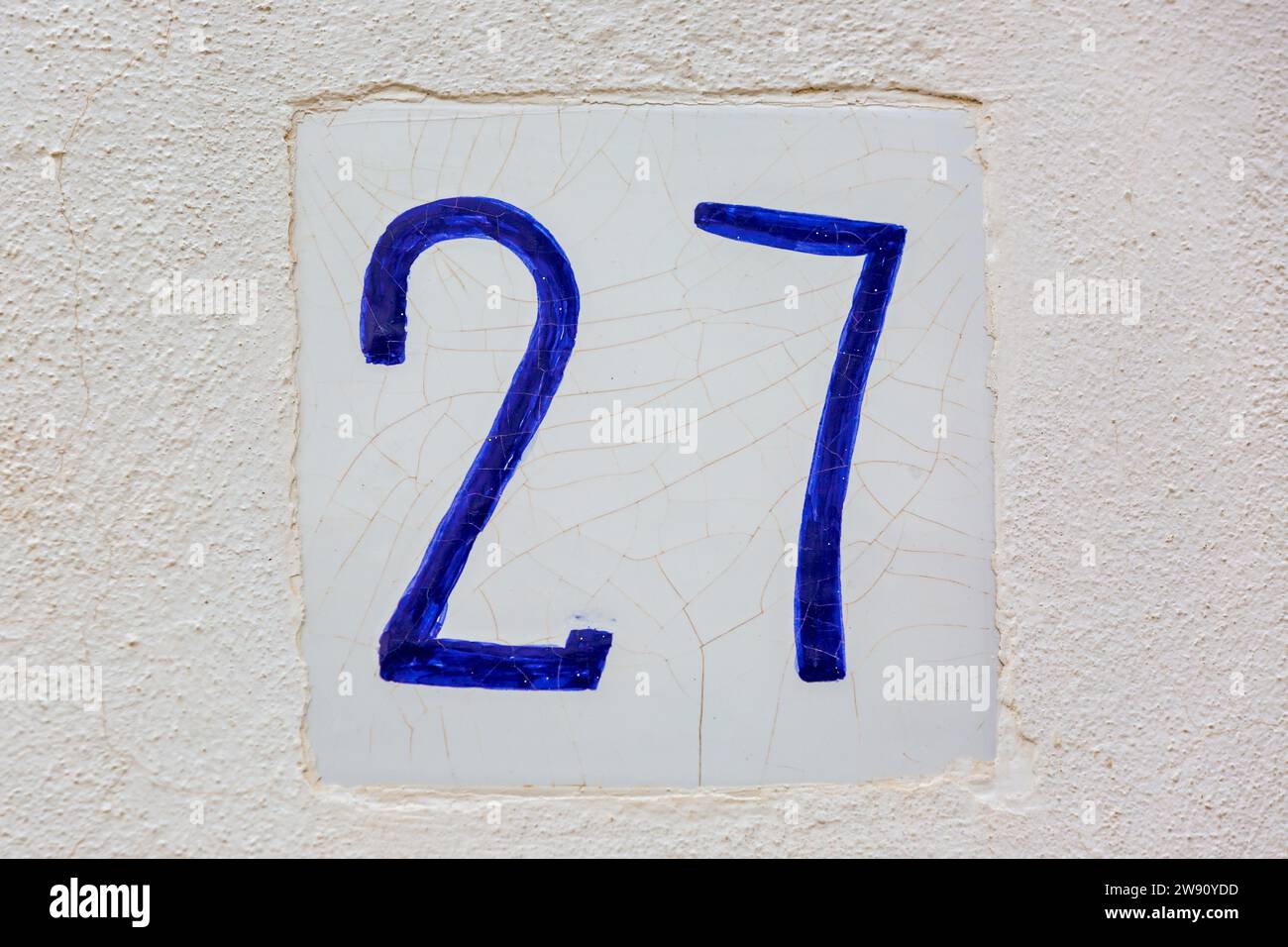 Old Weathered House Number 27, Tile on Wall Stock Photo - Alamy