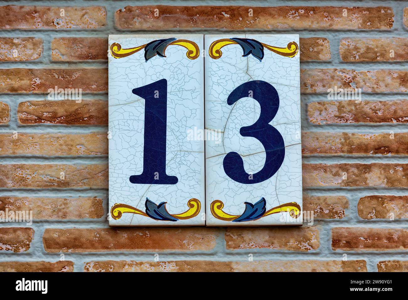 Brick House Number 13: Address Marker on House Wall Stock Photo - Alamy