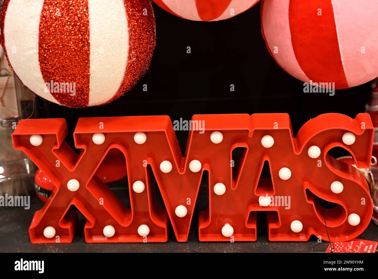 XMAS red lettering with red and white balls Stock Photo - Alamy