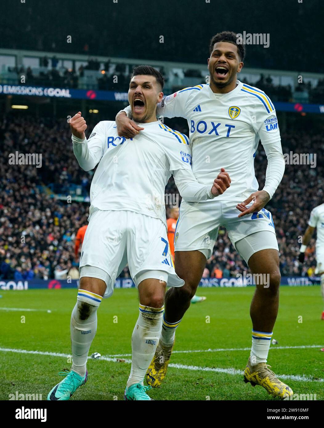 Leeds United's Joel Piroe (left) celebrates scoring his sides fourth ...